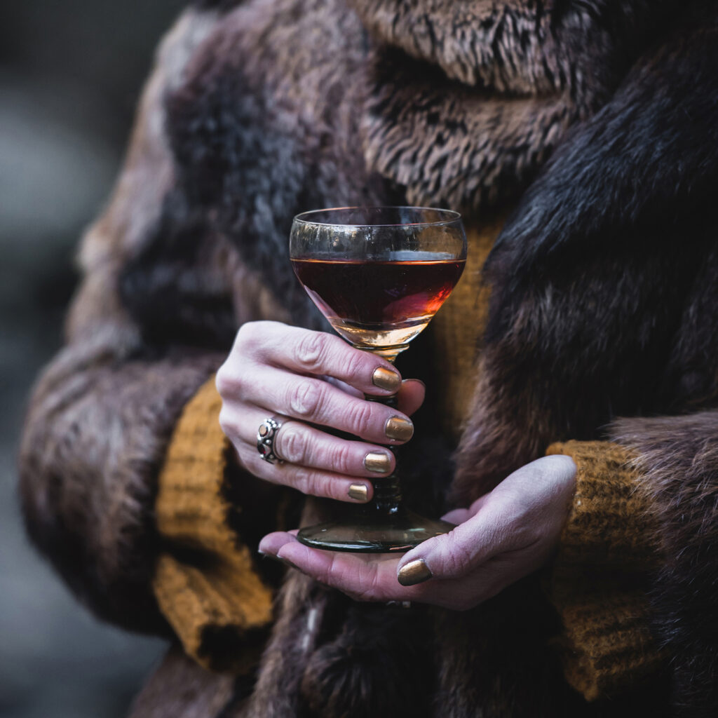 Big blue-black berries on barbed wire loved for the crimson sap they ...